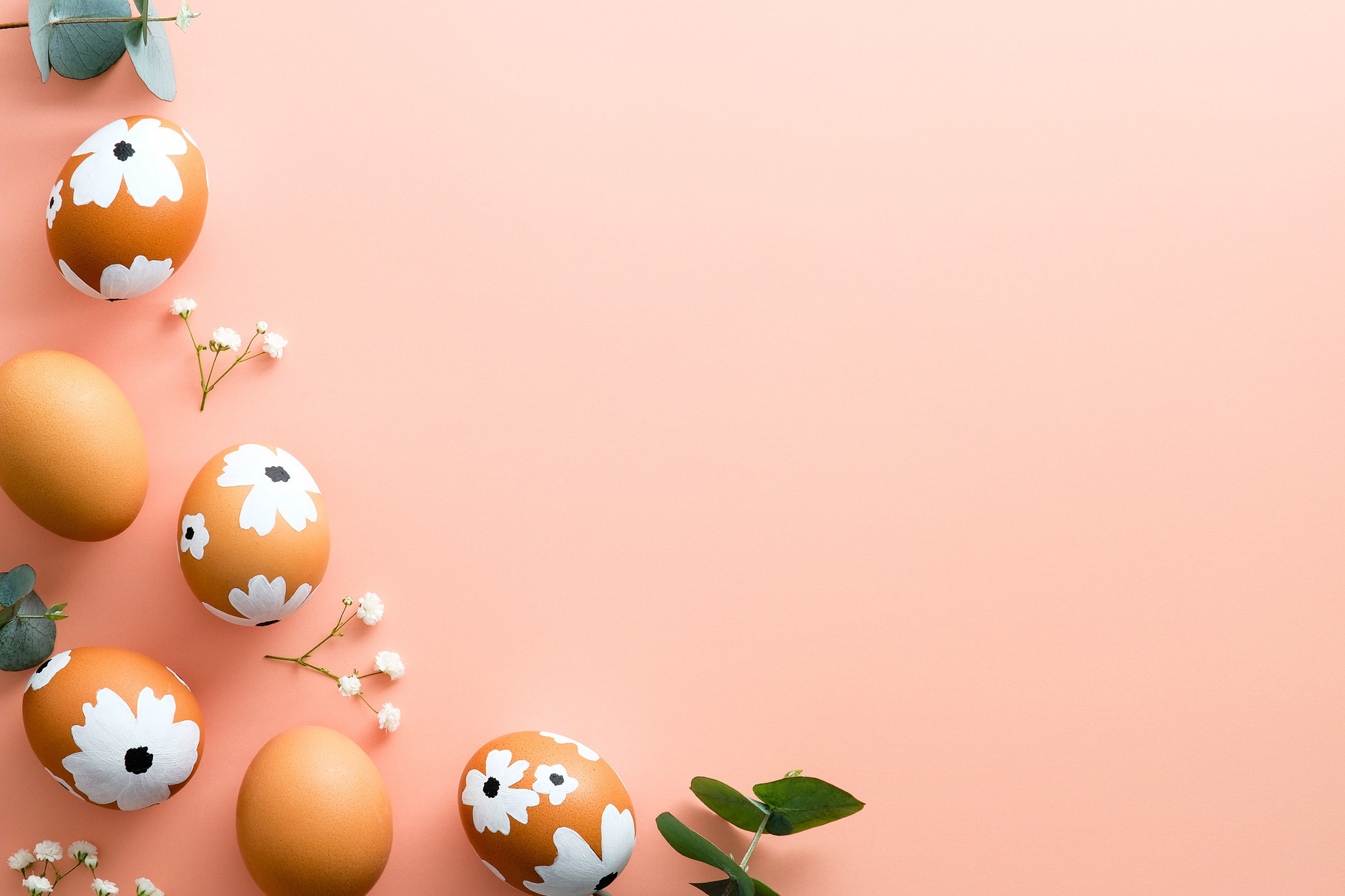 Happy Easter card. Frame made of Easter eggs and spring flowers on ...