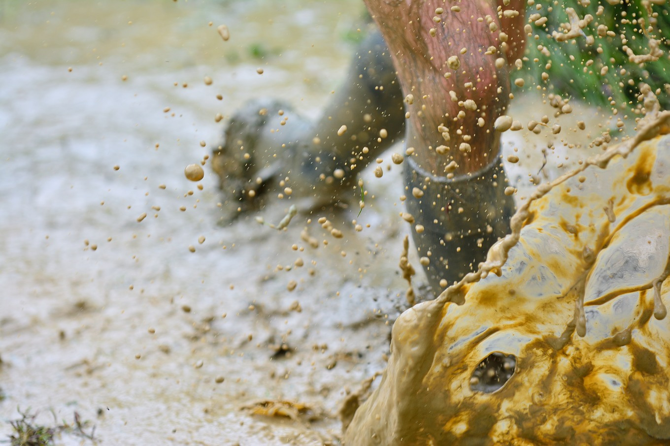 Man running in mud., a Sports & Recreation Photo by CreativePhotoSpain