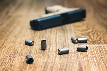 Pistol on the table | Industrial Stock Photos ~ Creative Market