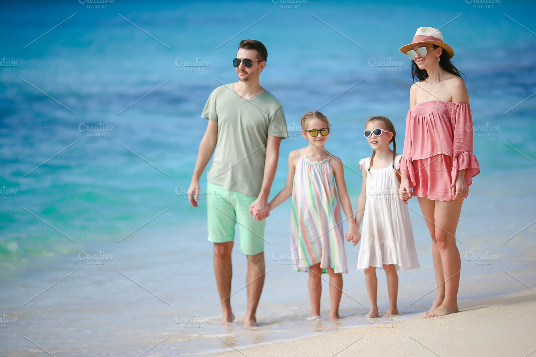 Happy beautiful family on the beach stock photo containing family and ...