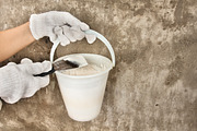 bucket with plaster and spatula, an Industrial Photo by rodimov