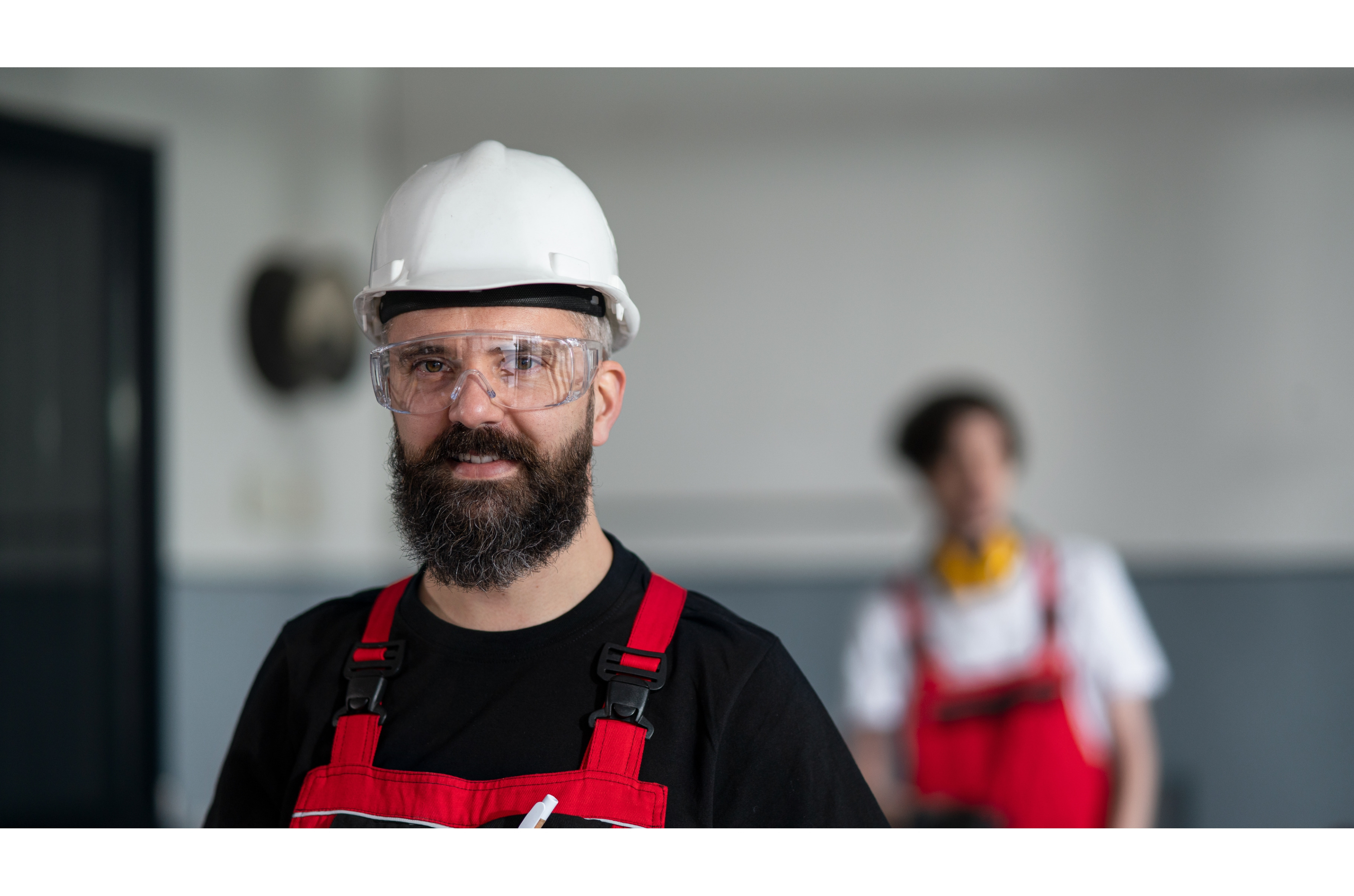 Portrait of worker with helmet and, a Person Photo by HalfPoint