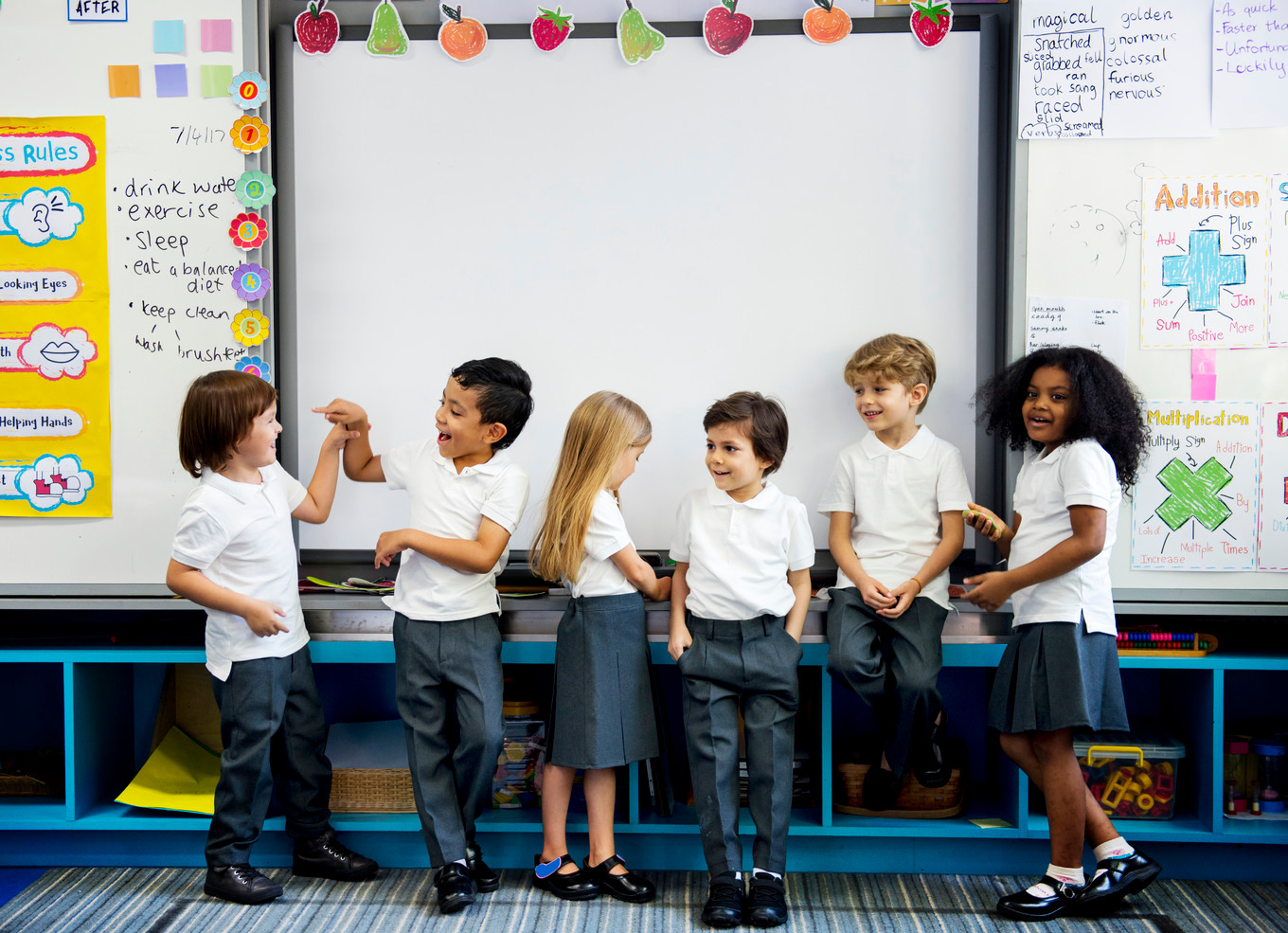 Happy kids at elementary school, a Photo by rawpixel