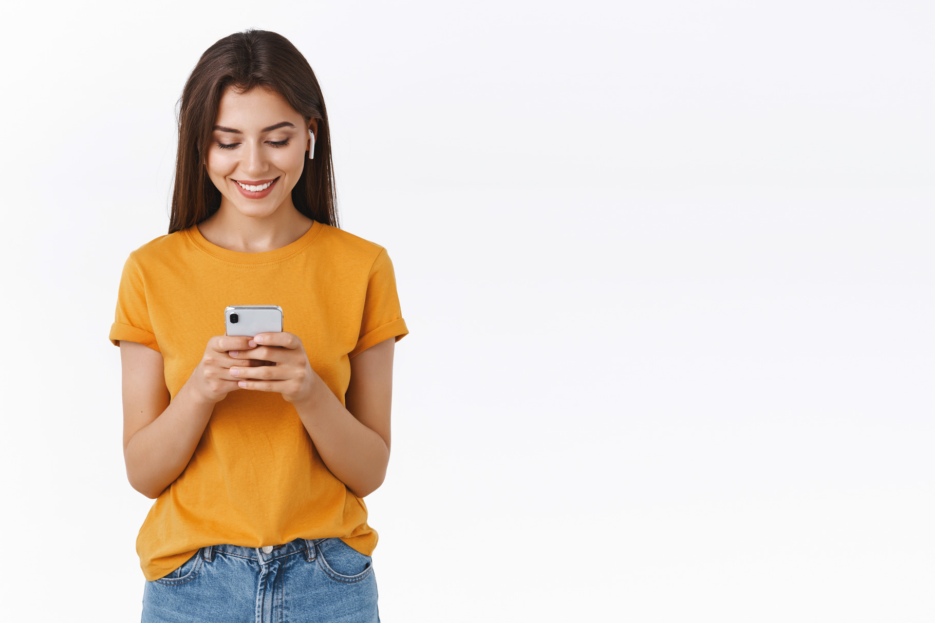 Happy girl texting mobile phone, a Person Photo by Cookie Studio