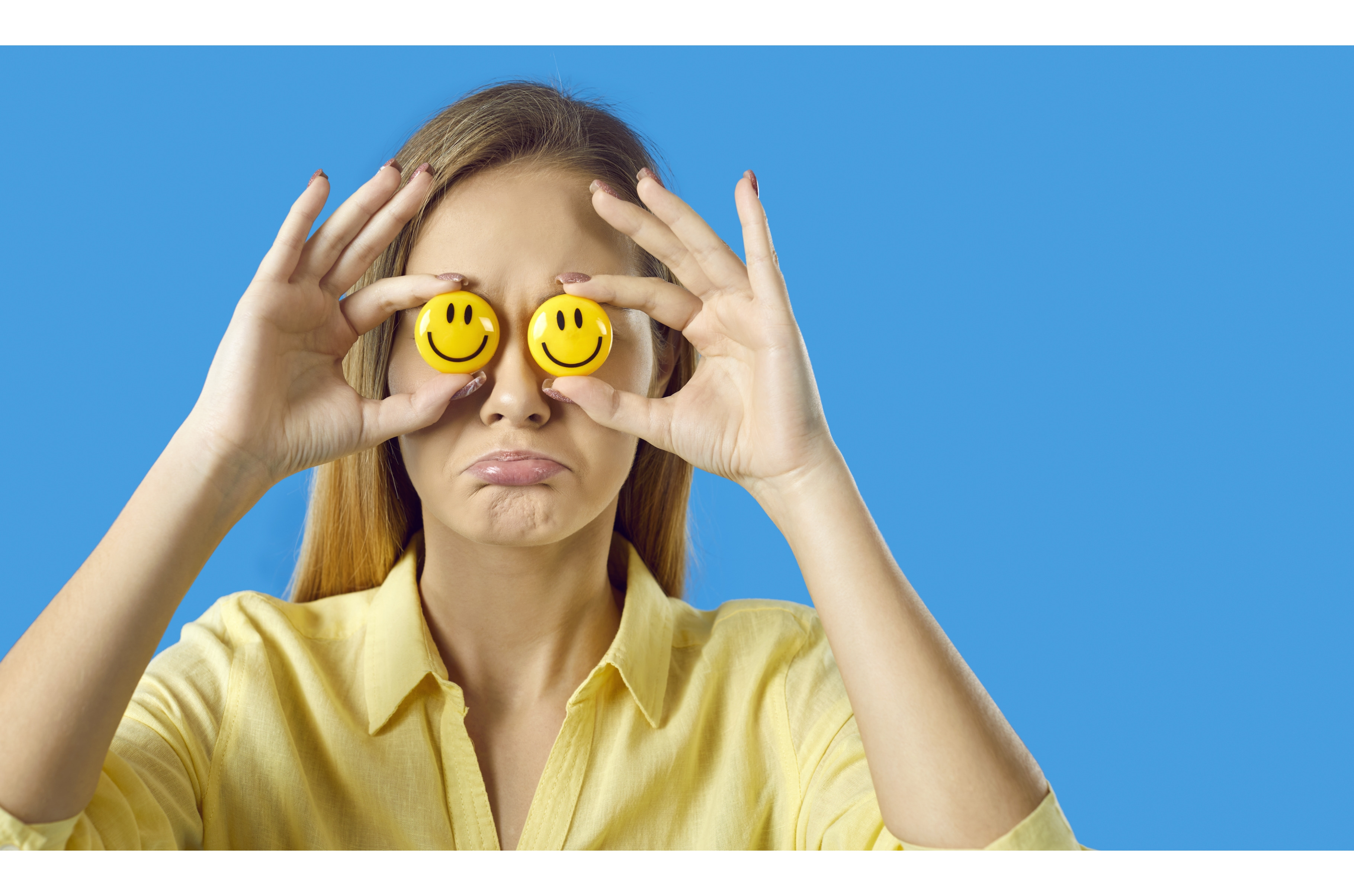 Sad woman trying to fake happiness, a Person Photo by StudioRomantic