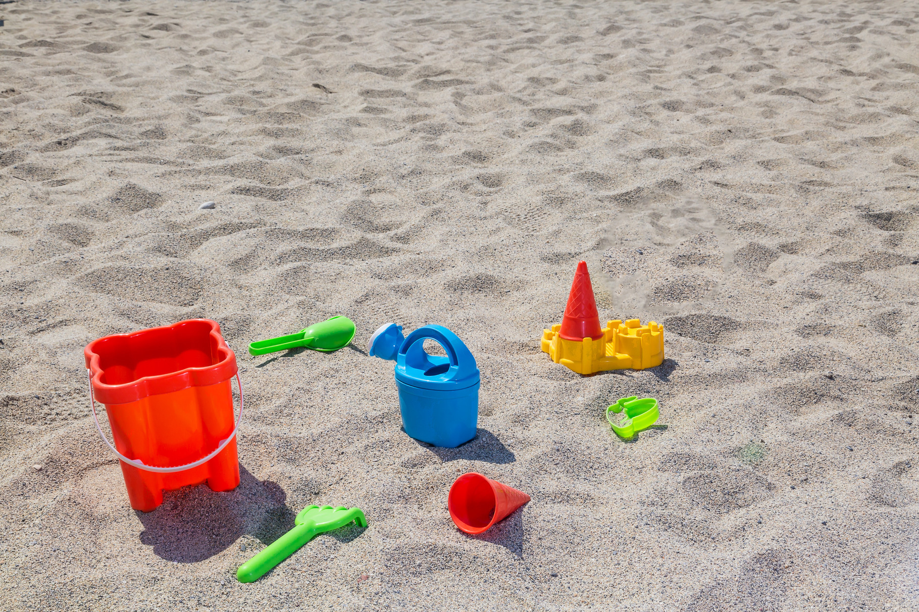 Children's toys on the beach sand ag featuring beach, sand, and summer ...