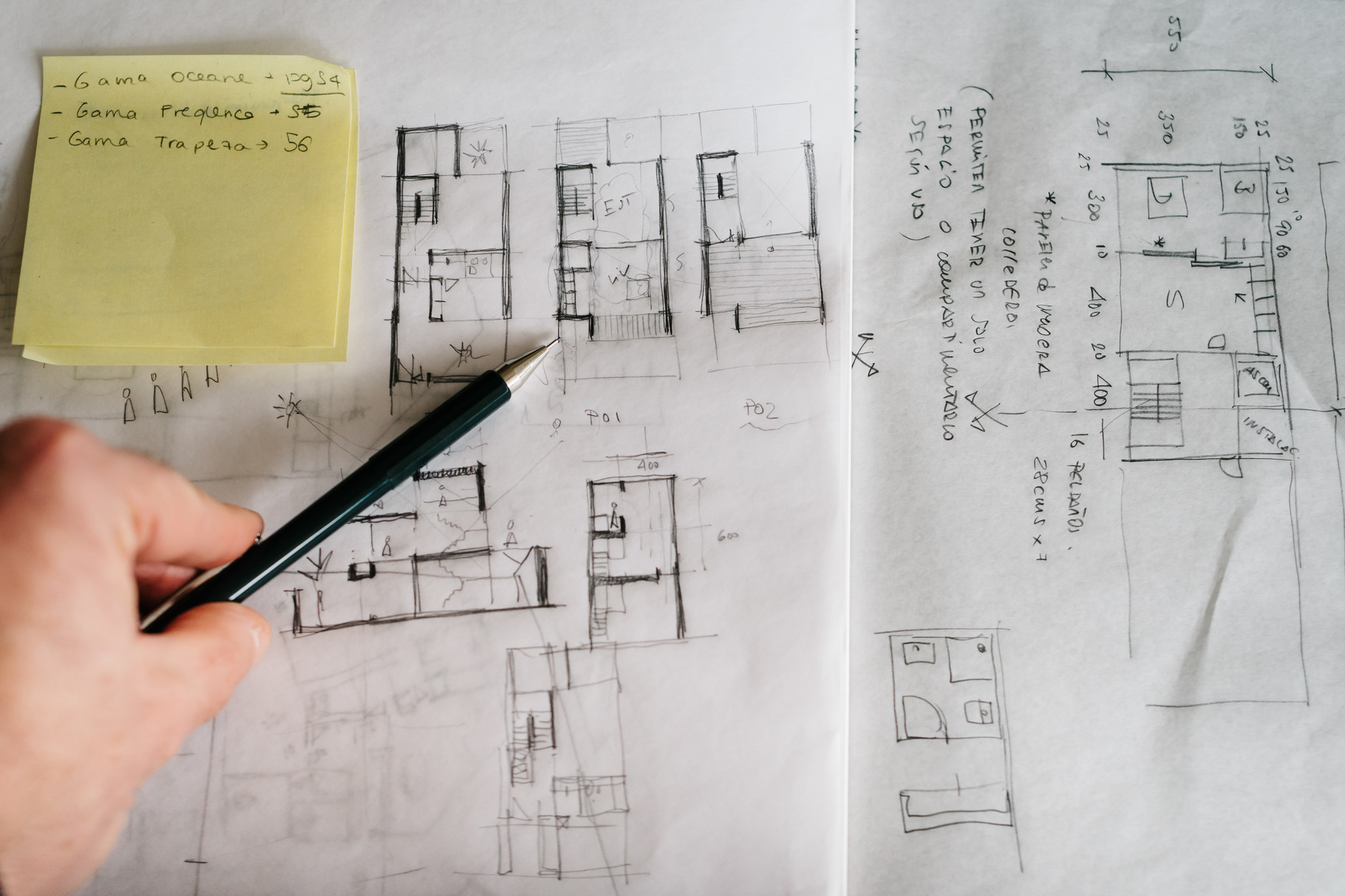 Architect drawing sketches by pencil, an Architecture Photo by ...