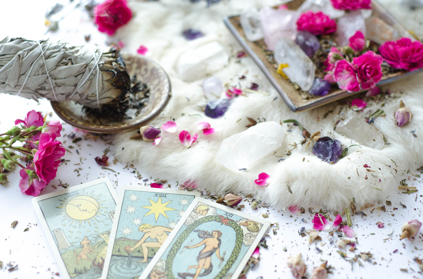 Sage crystals and tarot containing crystals, candle, and earthy, a ...