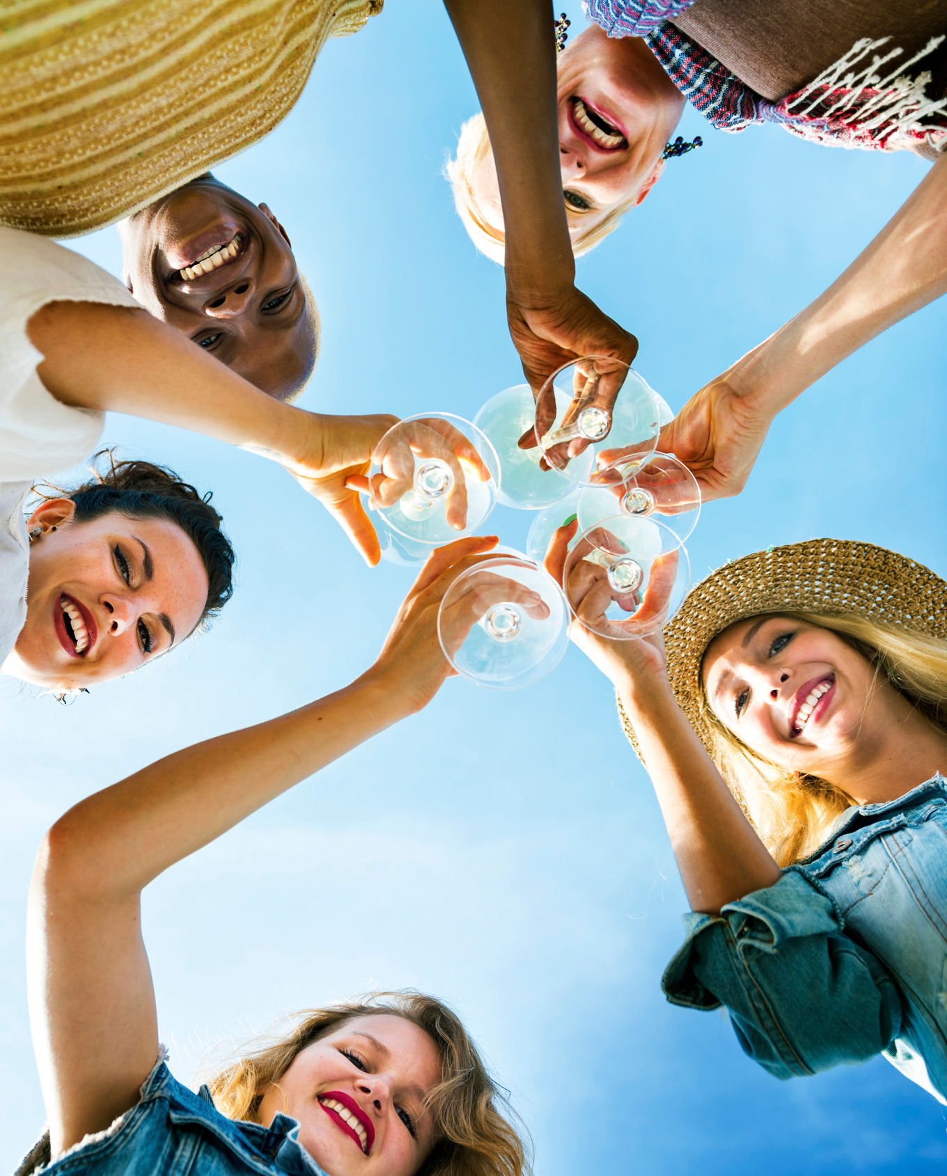 Group of friends cheers featuring activity, african descent, and ...