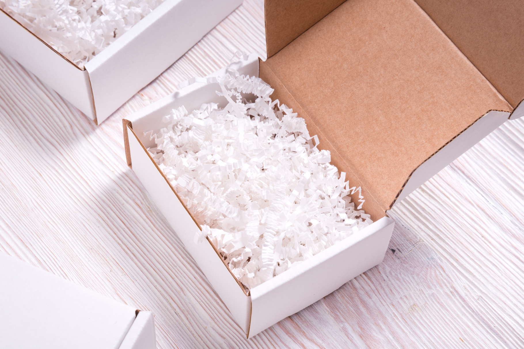 Shredded paper filler in cardboard b, a Background Photo by MDBildes
