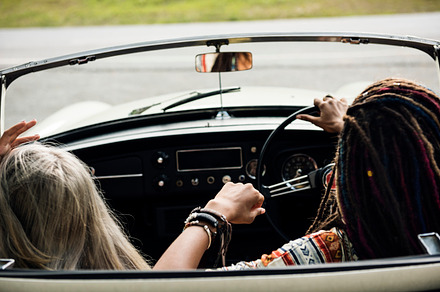 Friends enjoy car ride stock photo containing car and person, a Person ...
