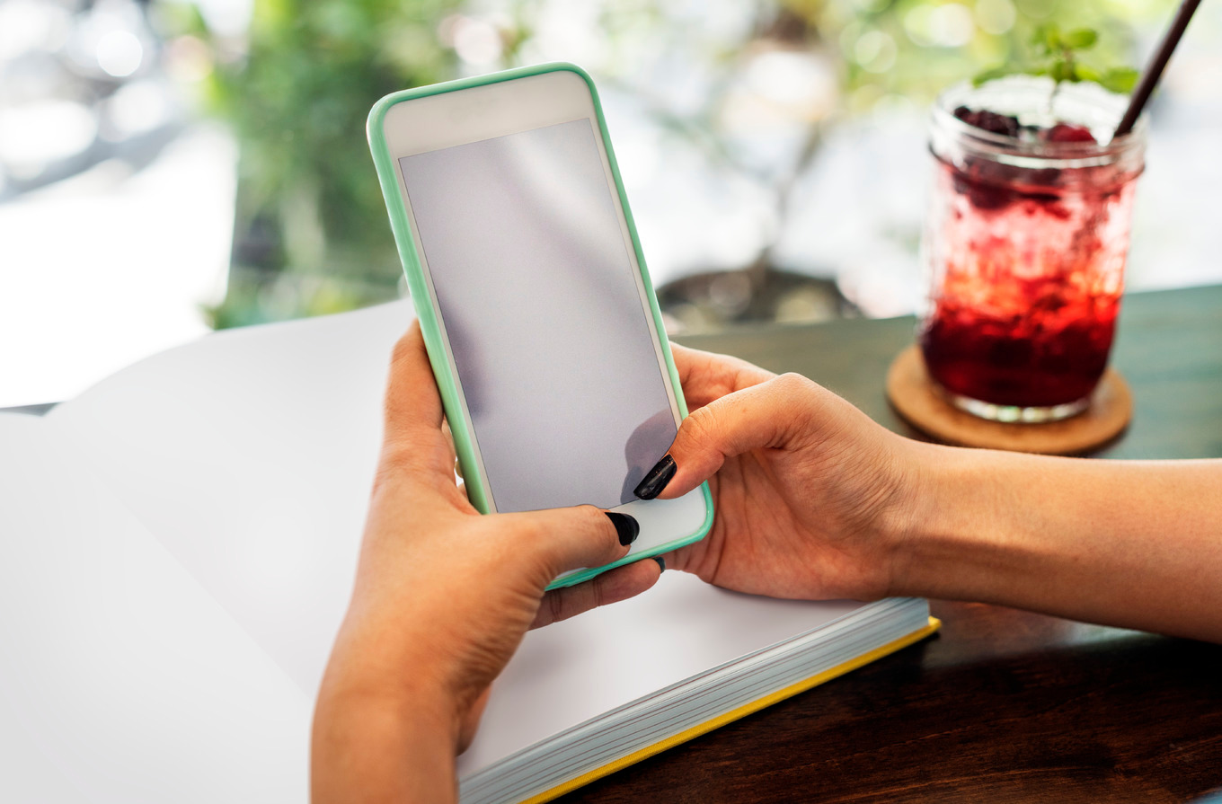 Hands working on mobile, a Photo by rawpixel
