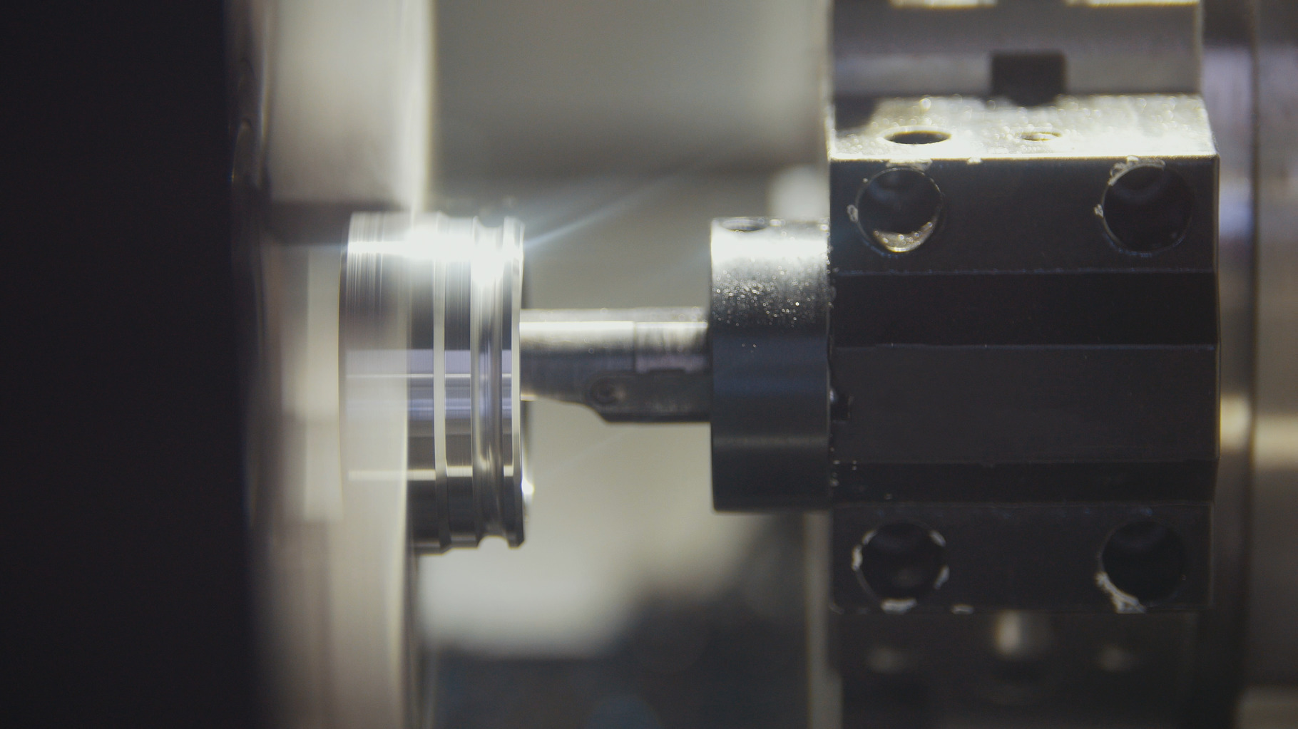 Replacing and placing the metal parts in the lathe for machining, an ...