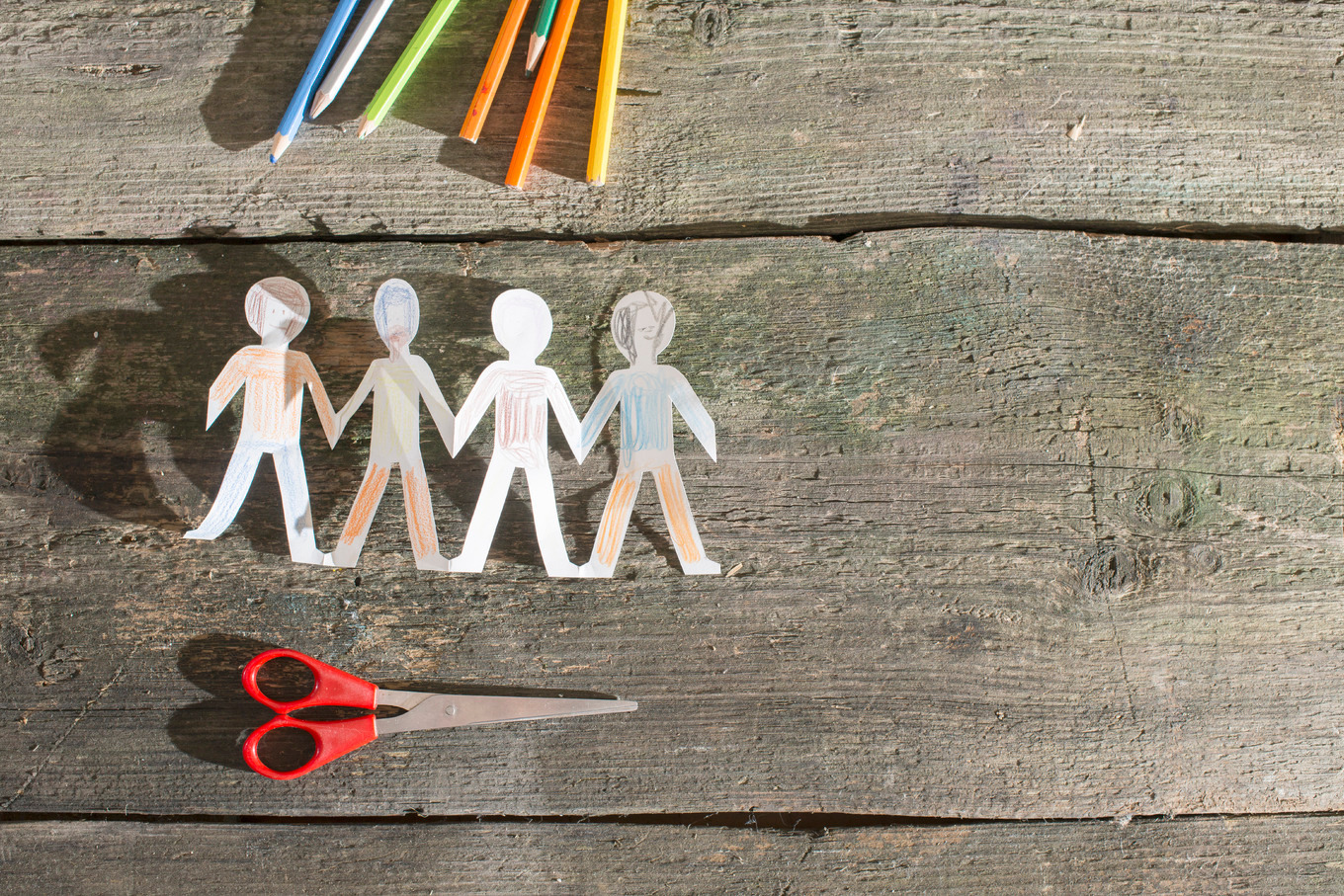 Paper made people figures containing paper, people, and group, a ...