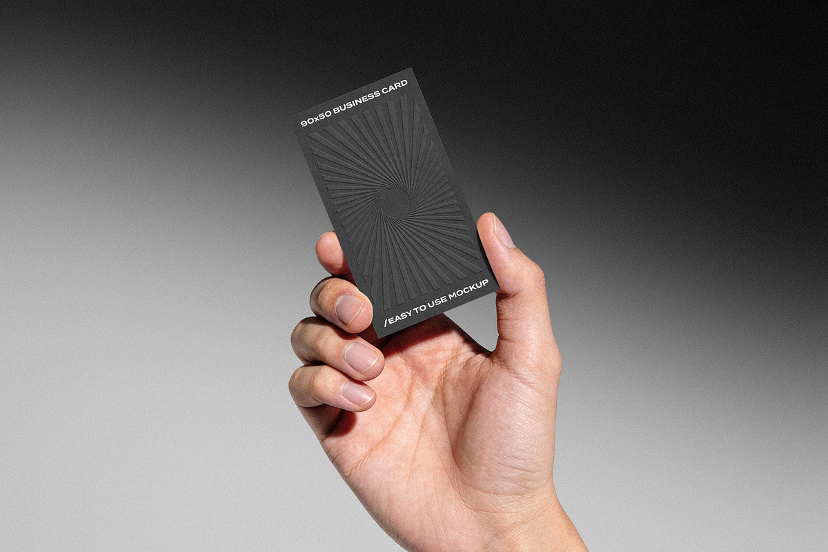 90x50 Business Card in Hand Mockup, a Pens & Pencil Mockup by Design Squad