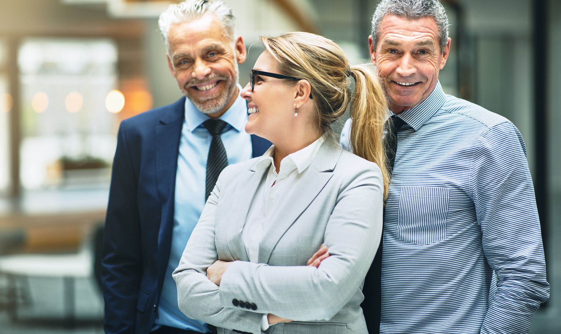 Laughing group of mature executives, a Business Photo by Stefan & Janni