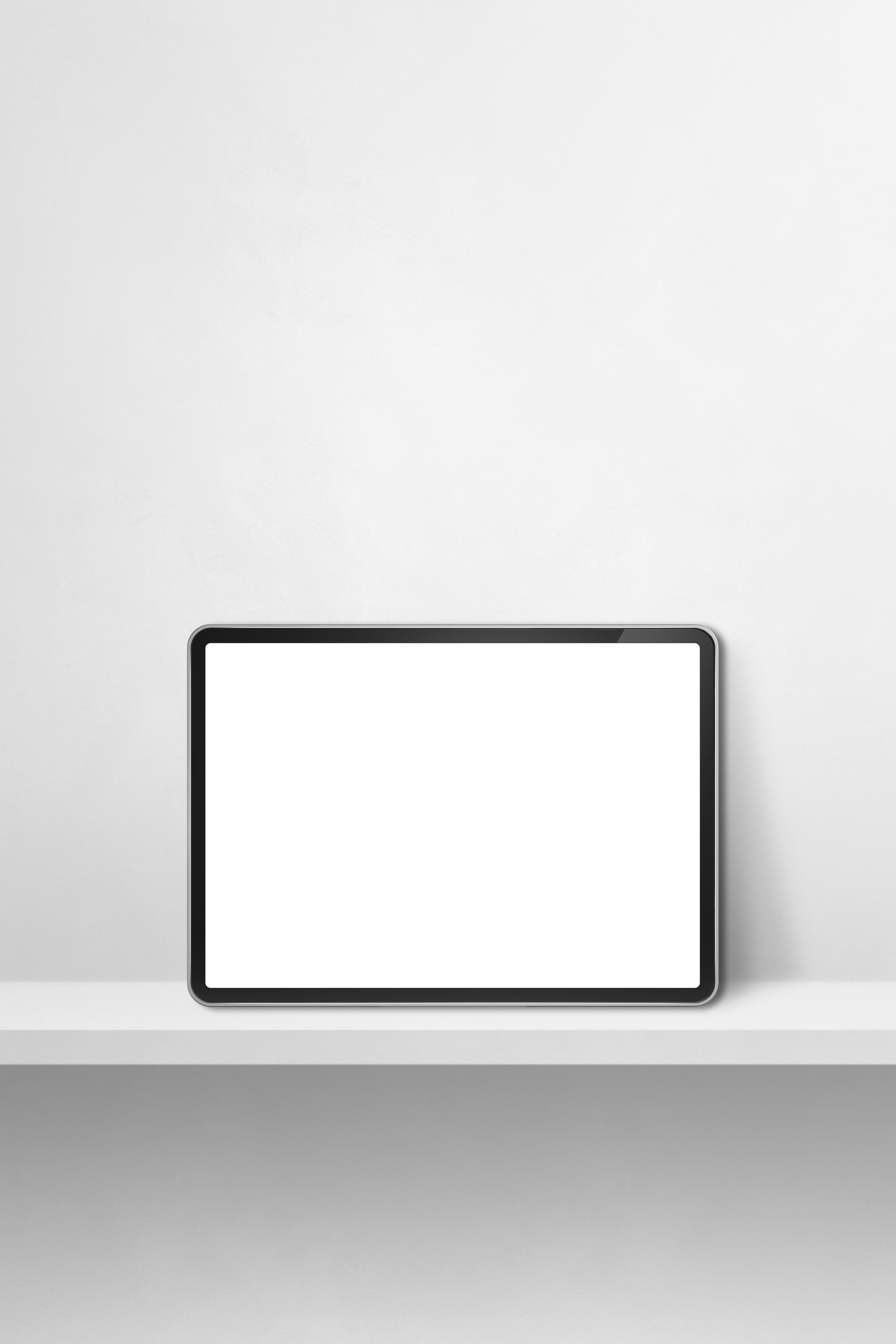 Digital tablet pc on white wall shelf. Vertical background banne, a ...