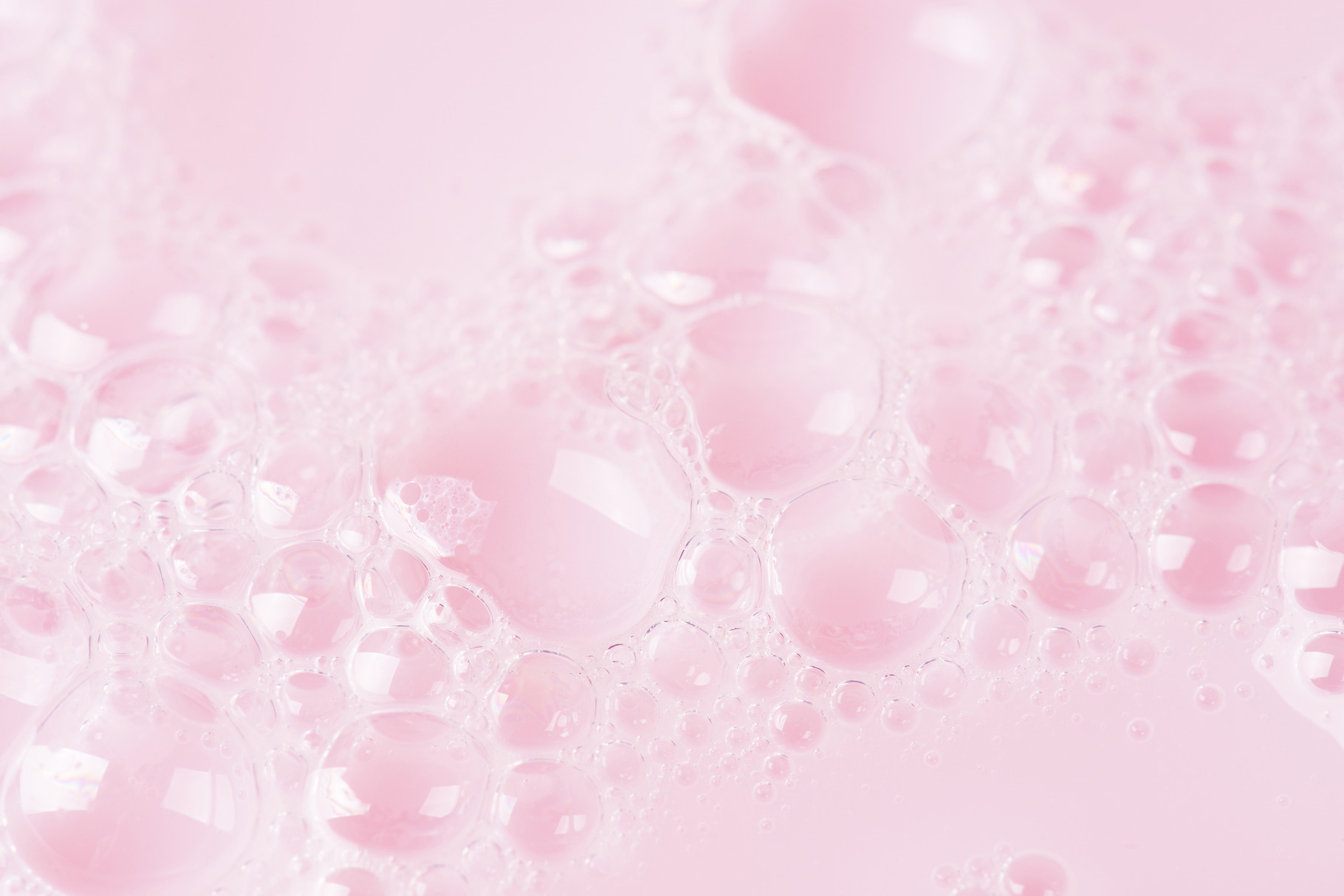 Foamed surface of pink liquid soap, a Beauty & Fashion Photo by AlinaKho