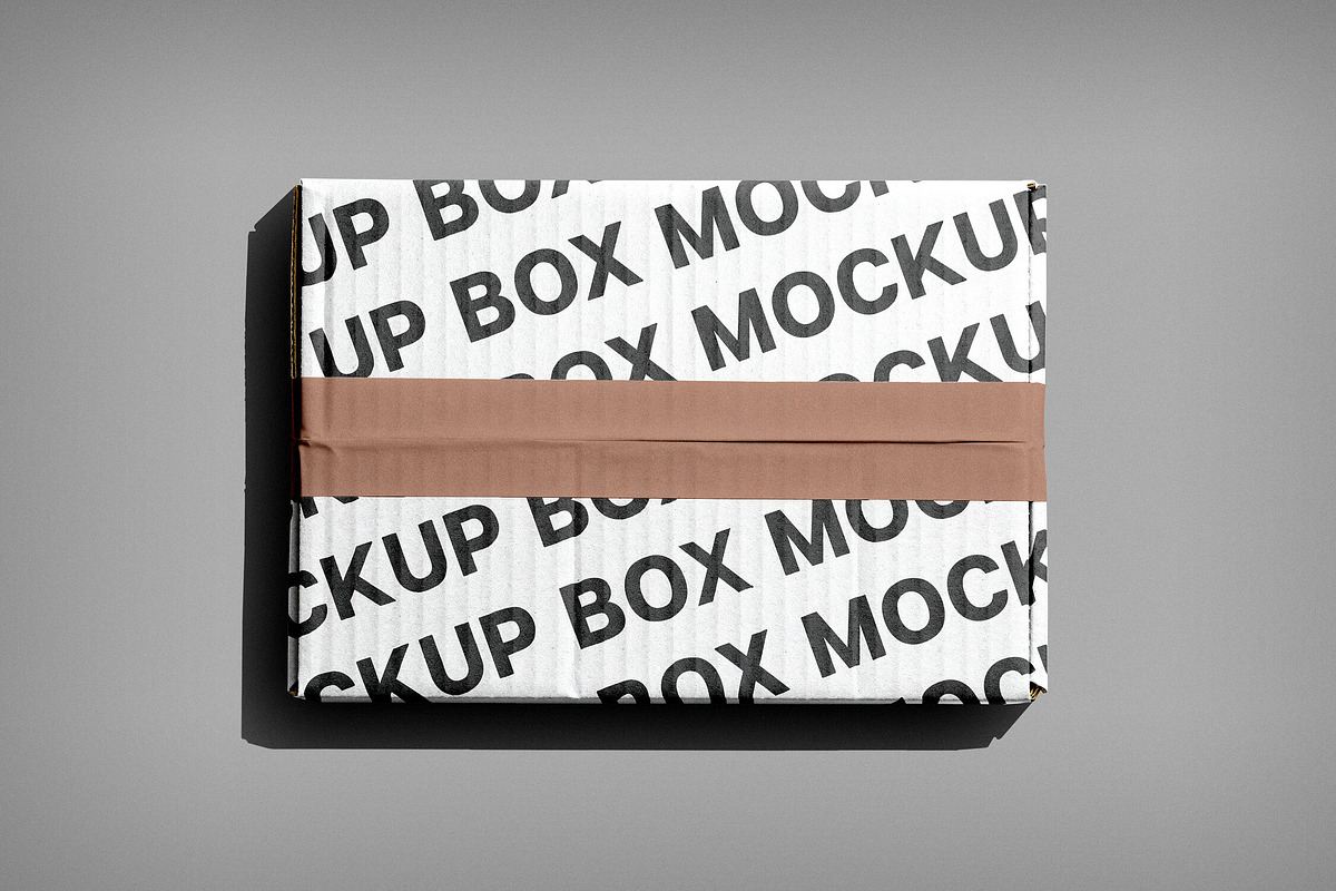 Parcel Box Mockup, a Packaging Mockup by Design Squad