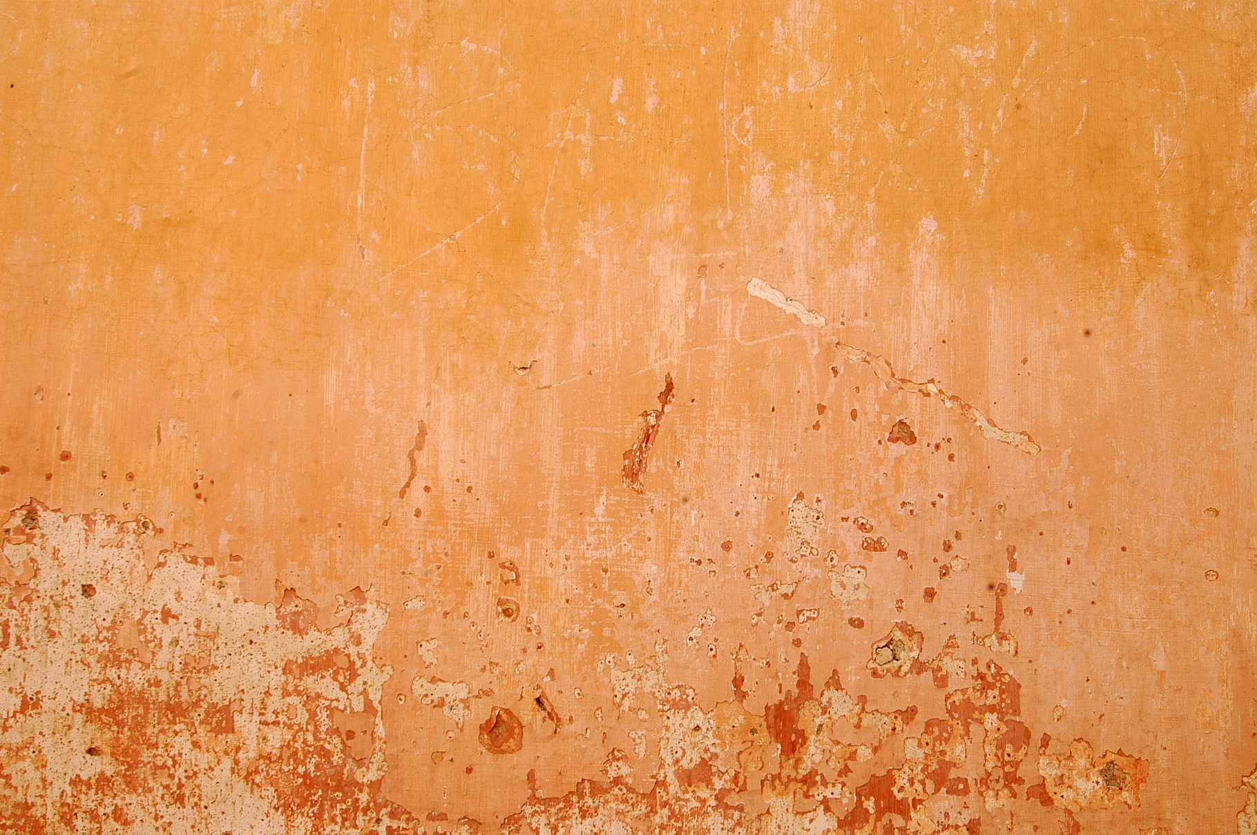 painted wall with orange tones, an Abstract Photo by ffmr