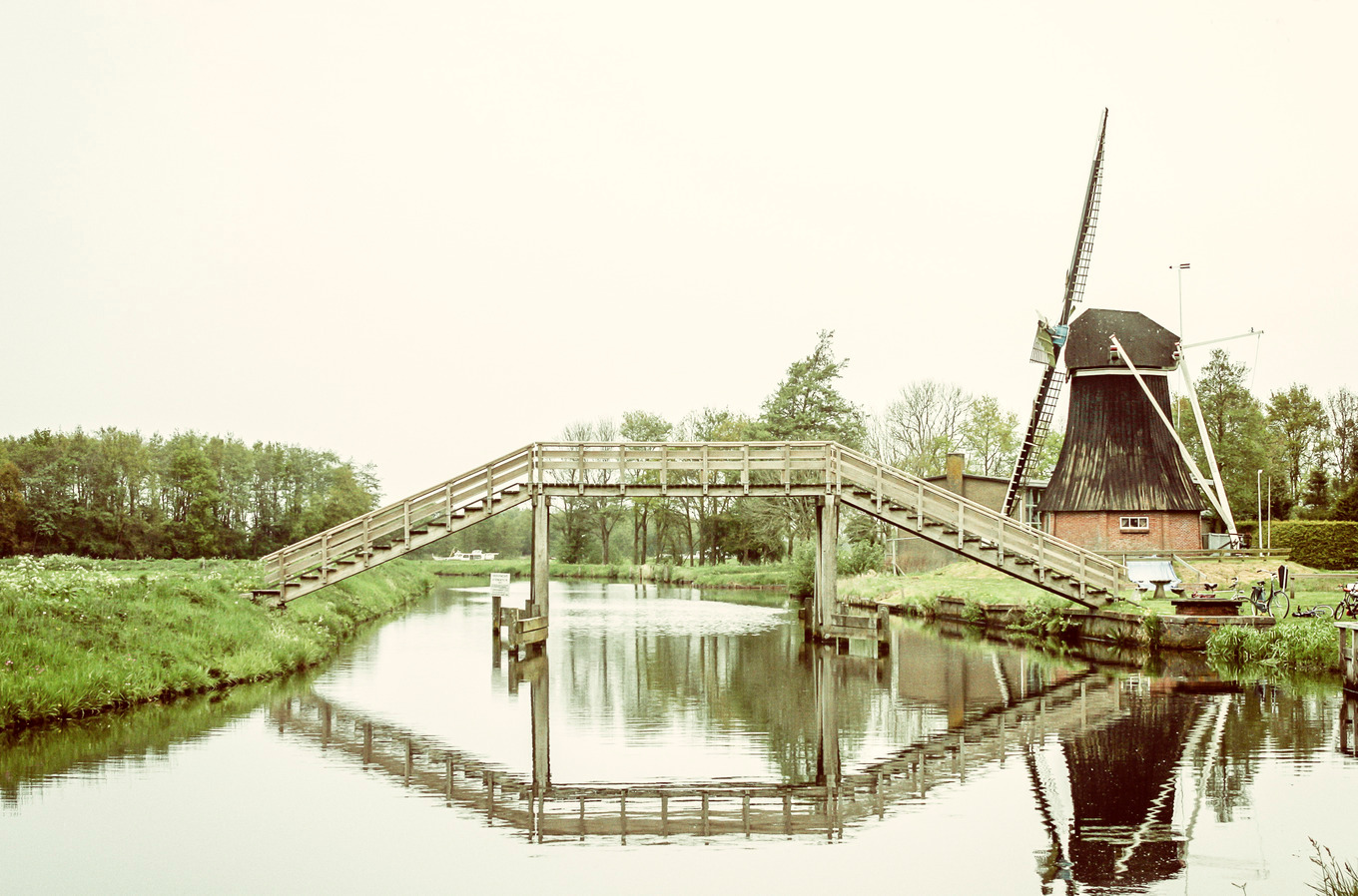 High Dutch wooden bridge and mill, an Architecture Photo by Patricia ...