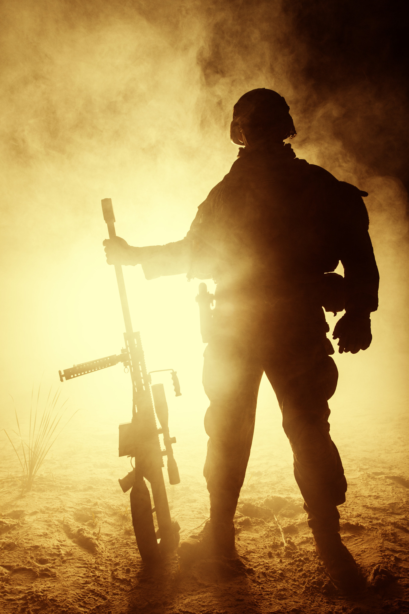 Army sniper in the fire and smoke, a Person Photo by Getmilitaryphotos