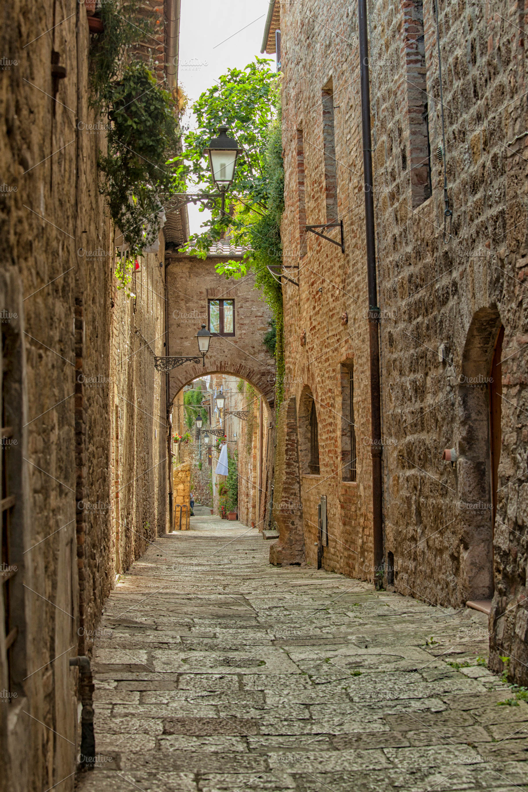 Italian cobblestone street, an Architecture Photo by Patricia Hofmeester