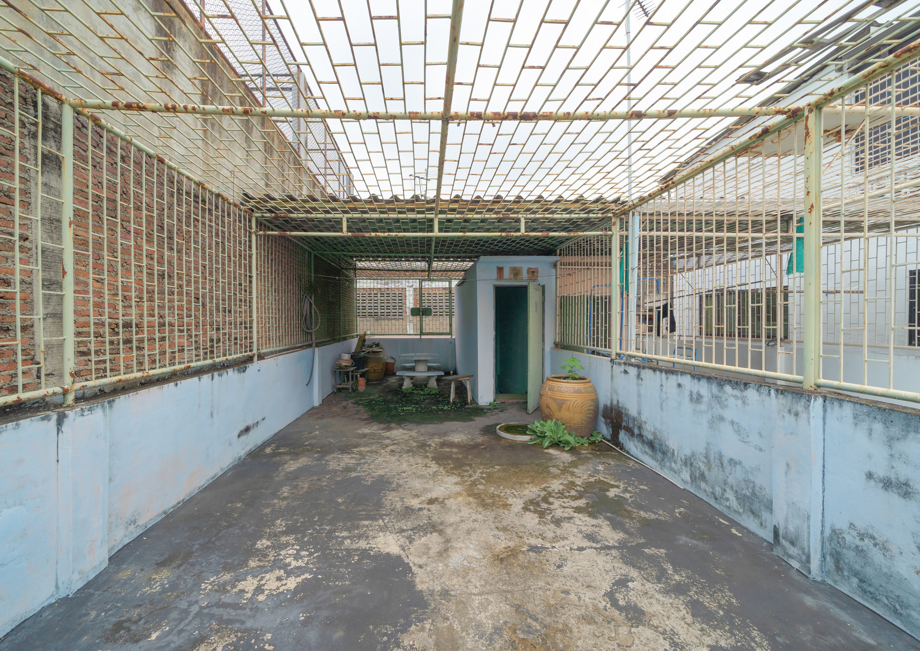 Empty dirty abandoned deteriorated rooftop on home or house with, a ...