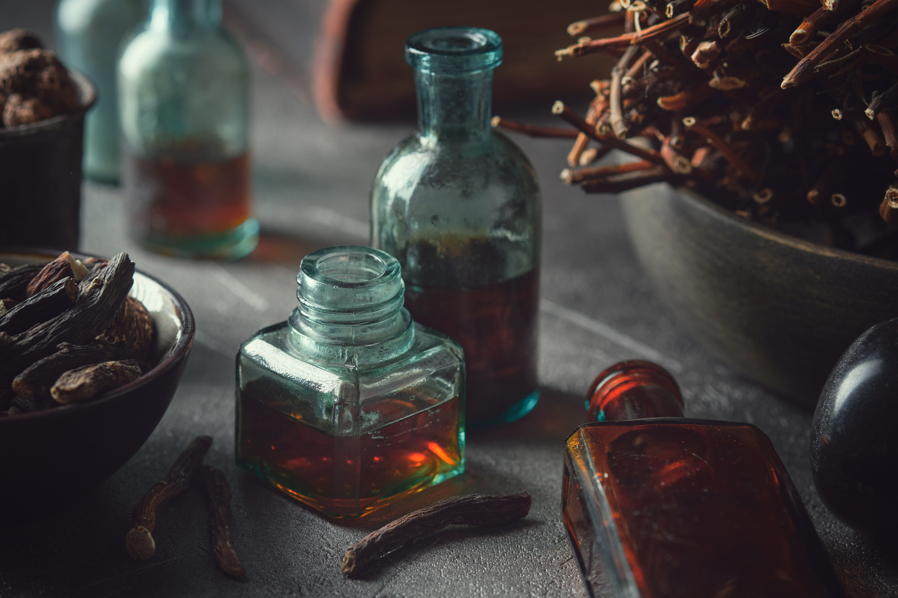 Bottles of infusion, dried roots., a Health & Medical Photo by ...