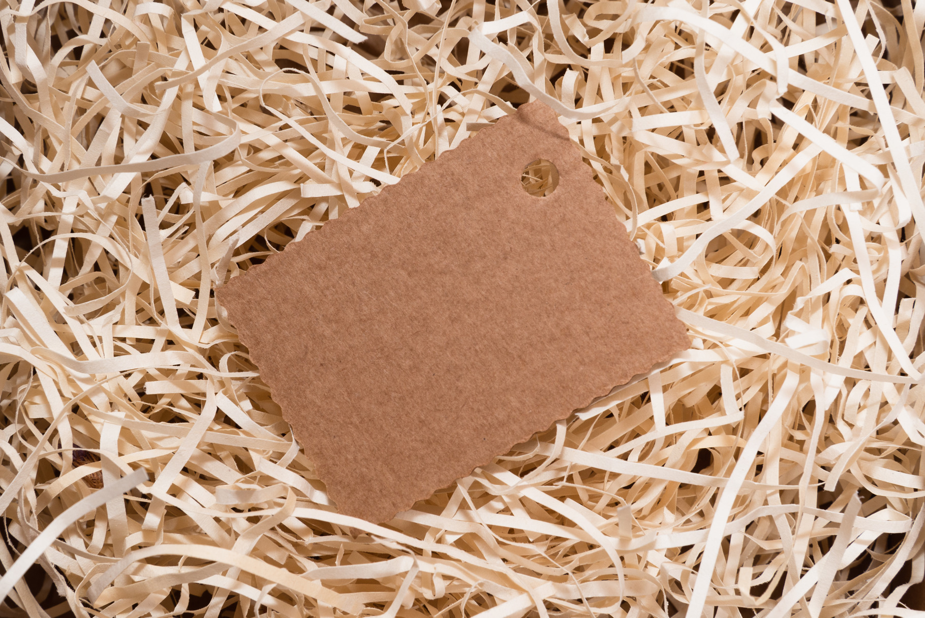 Brown carton, cardboard tag label with filler, an Industrial Photo by ...