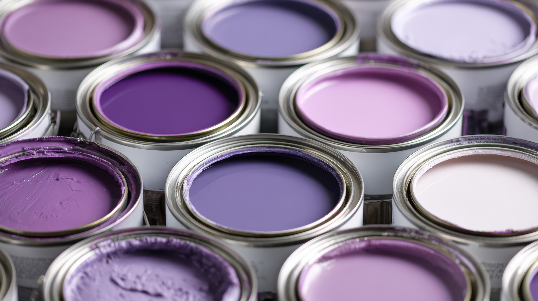 Row of purple paint cans, a Photo by Beautiful things