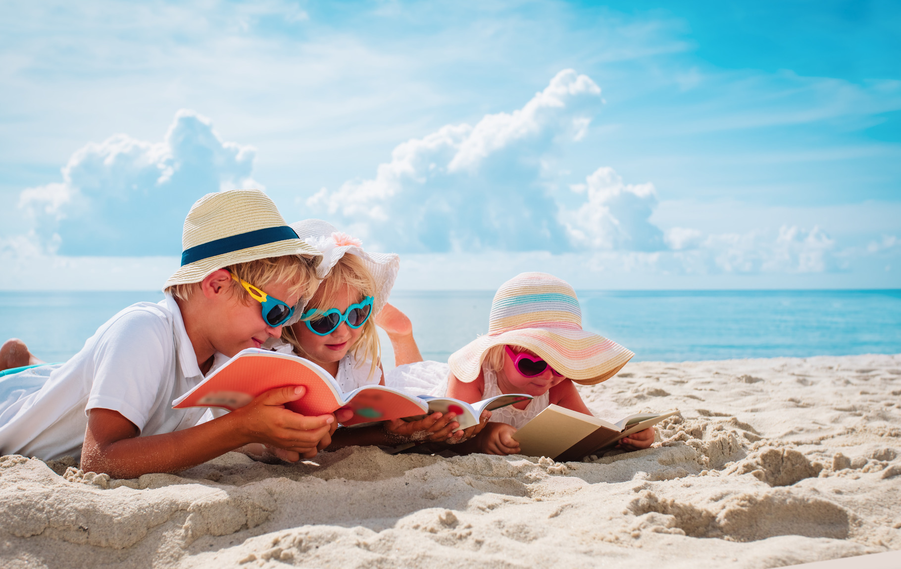 Kids reading books at beach stock photo containing kid and read, a ...