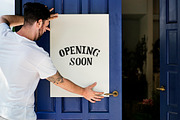 Man putting on store sign (PSD), a Person Photo by rawpixel