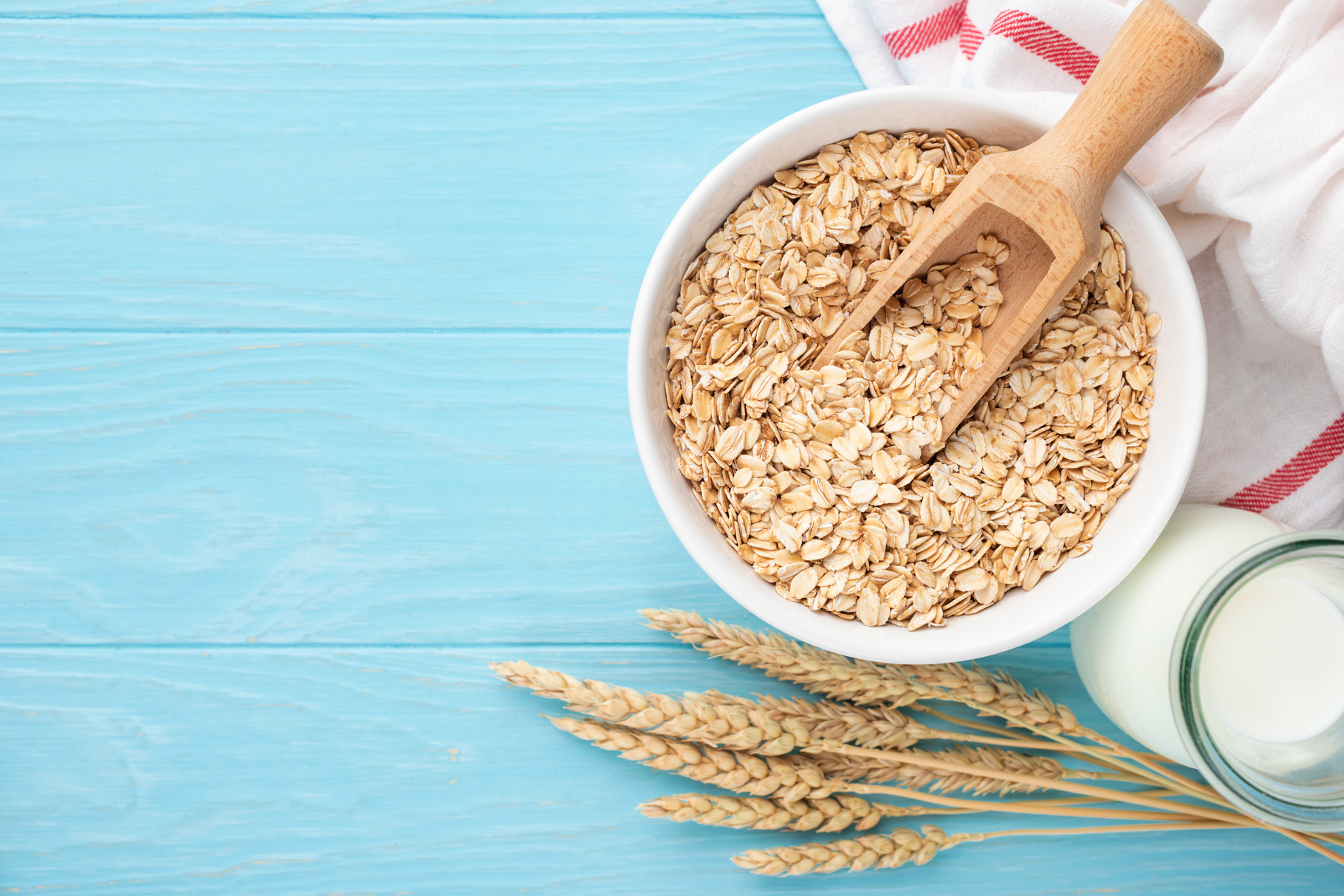 Oats and oat milk on blue background, a Food & Drink Photo by The ...