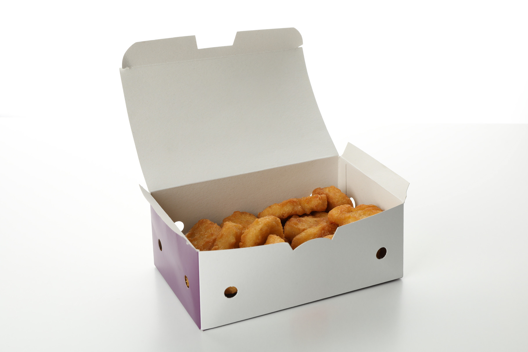 Carton box with fried crispy chicken nuggets isolated on white b, a ...