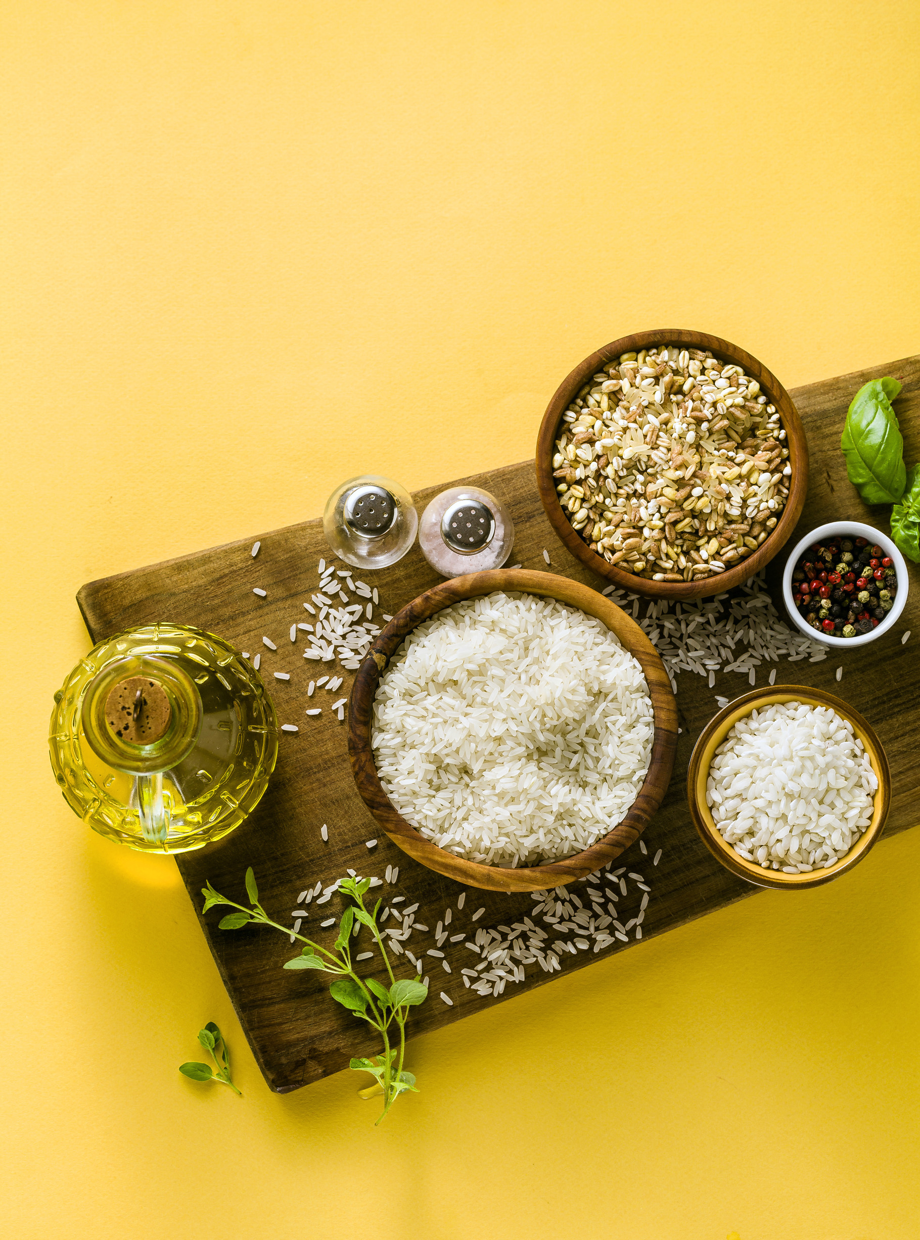Different types of rice on a wooden containing rice, types, and ...