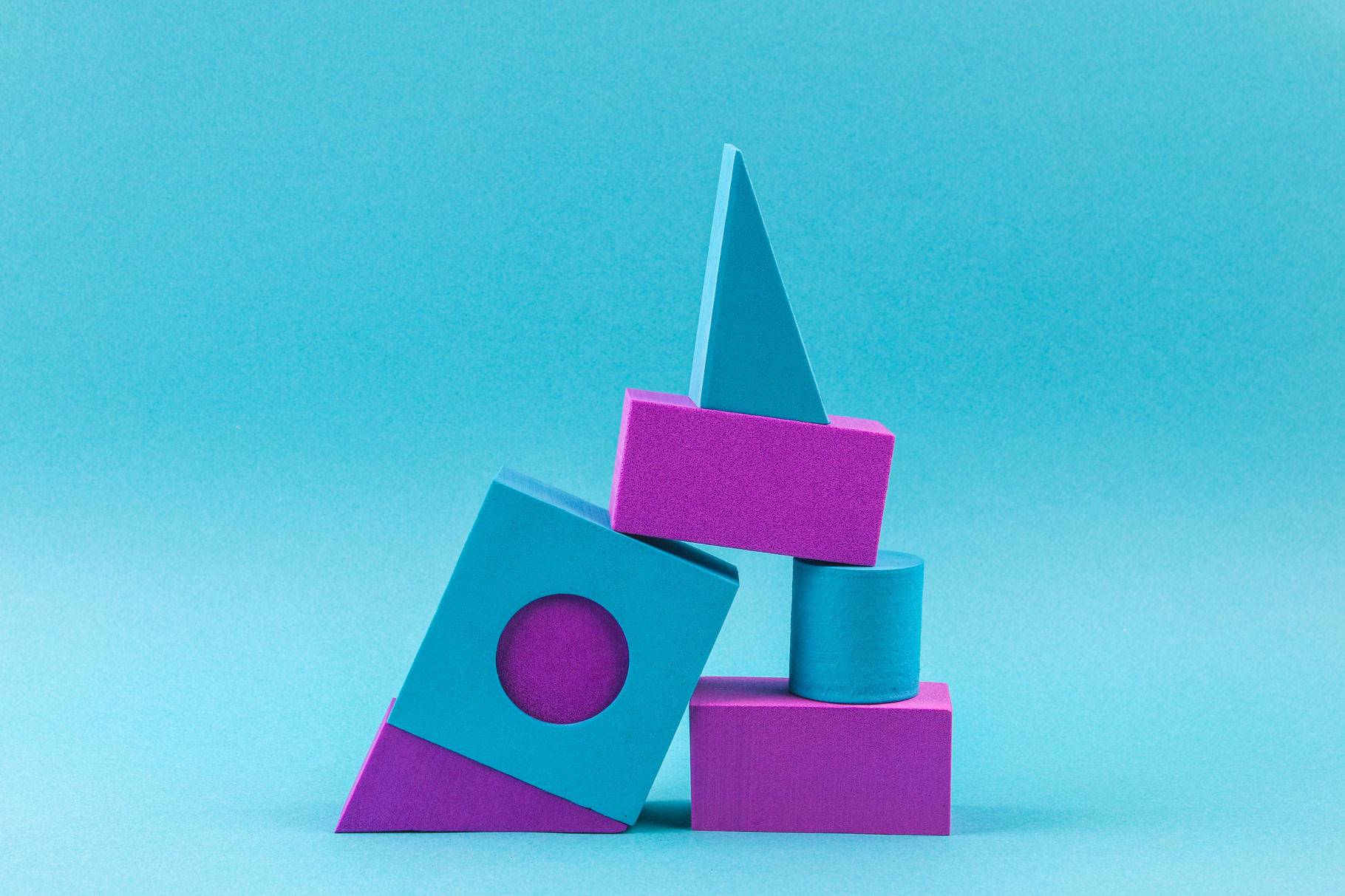 Blue and violet geometric shapes on, an Abstract Photo by Detriana