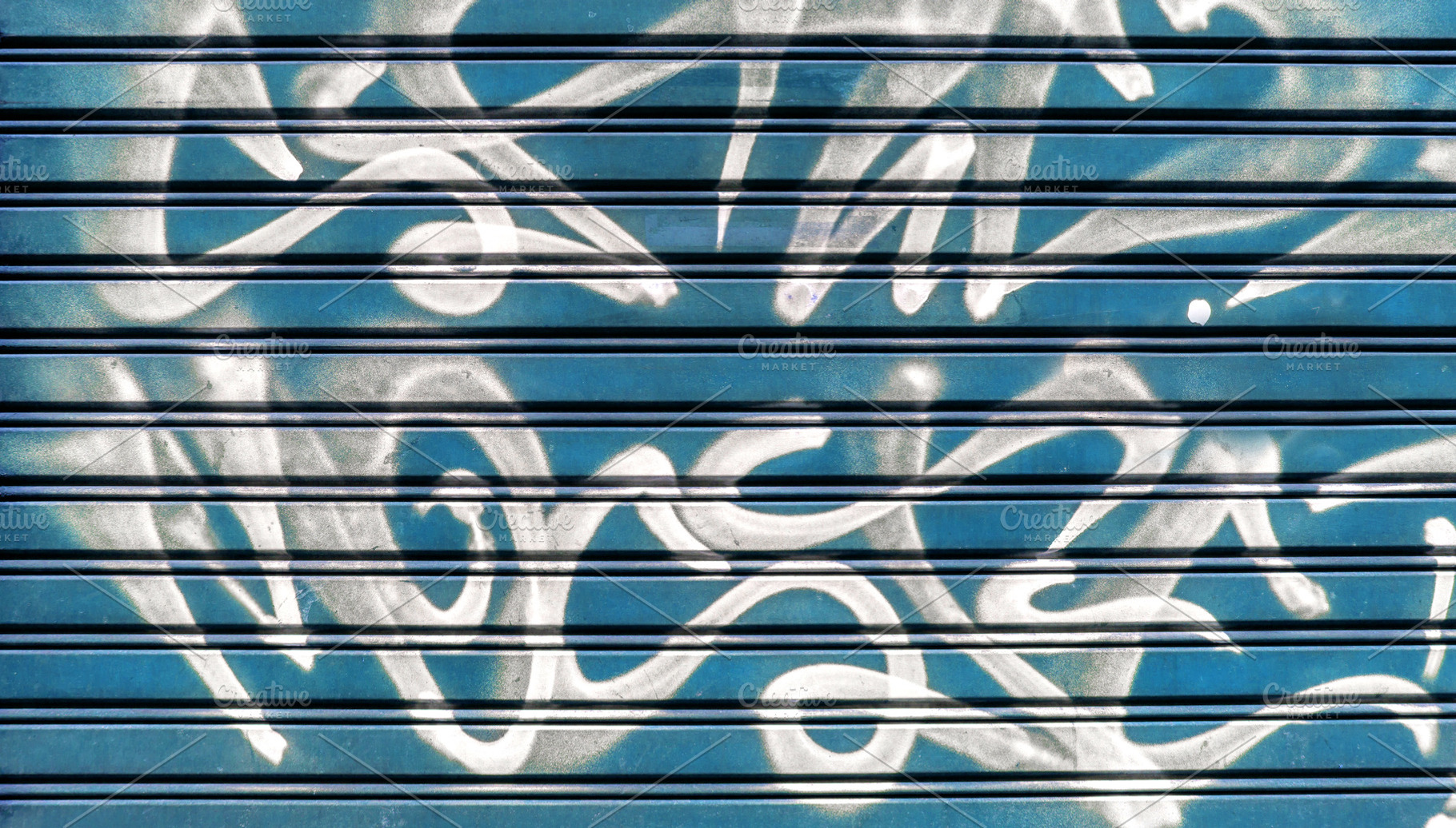 Blue garage gate with graffiti, an Abstract Photo by KYNA STUDIO ...