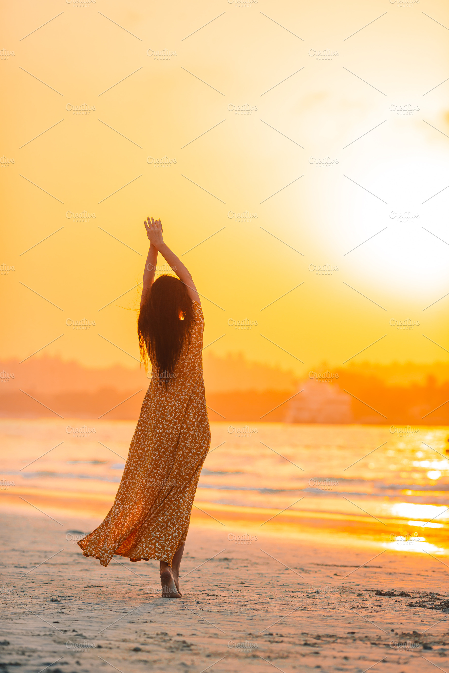 Woman laying on the beach enjoying s containing beach, vacation, and ...