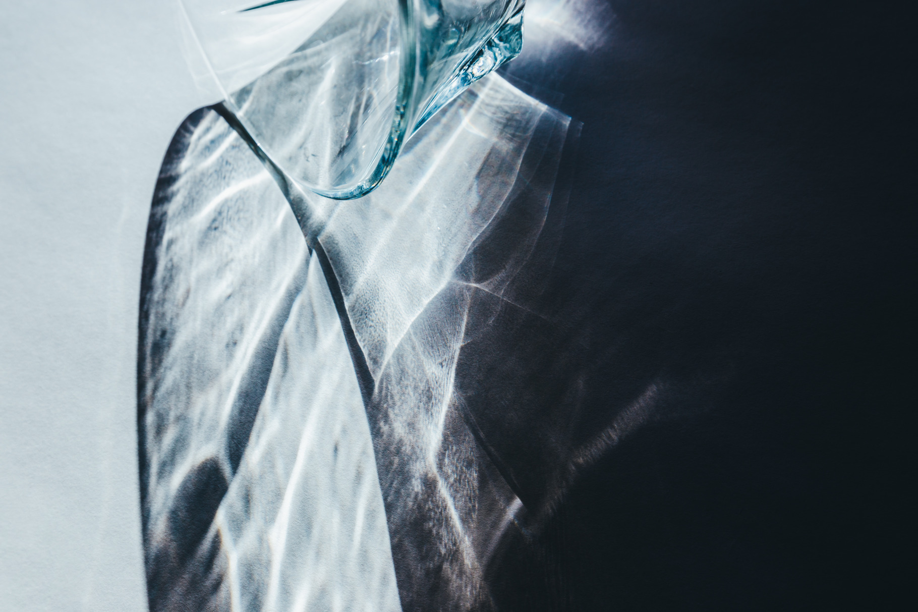 Glass goblets cast beautiful shadow featuring glass, caustics, and ...