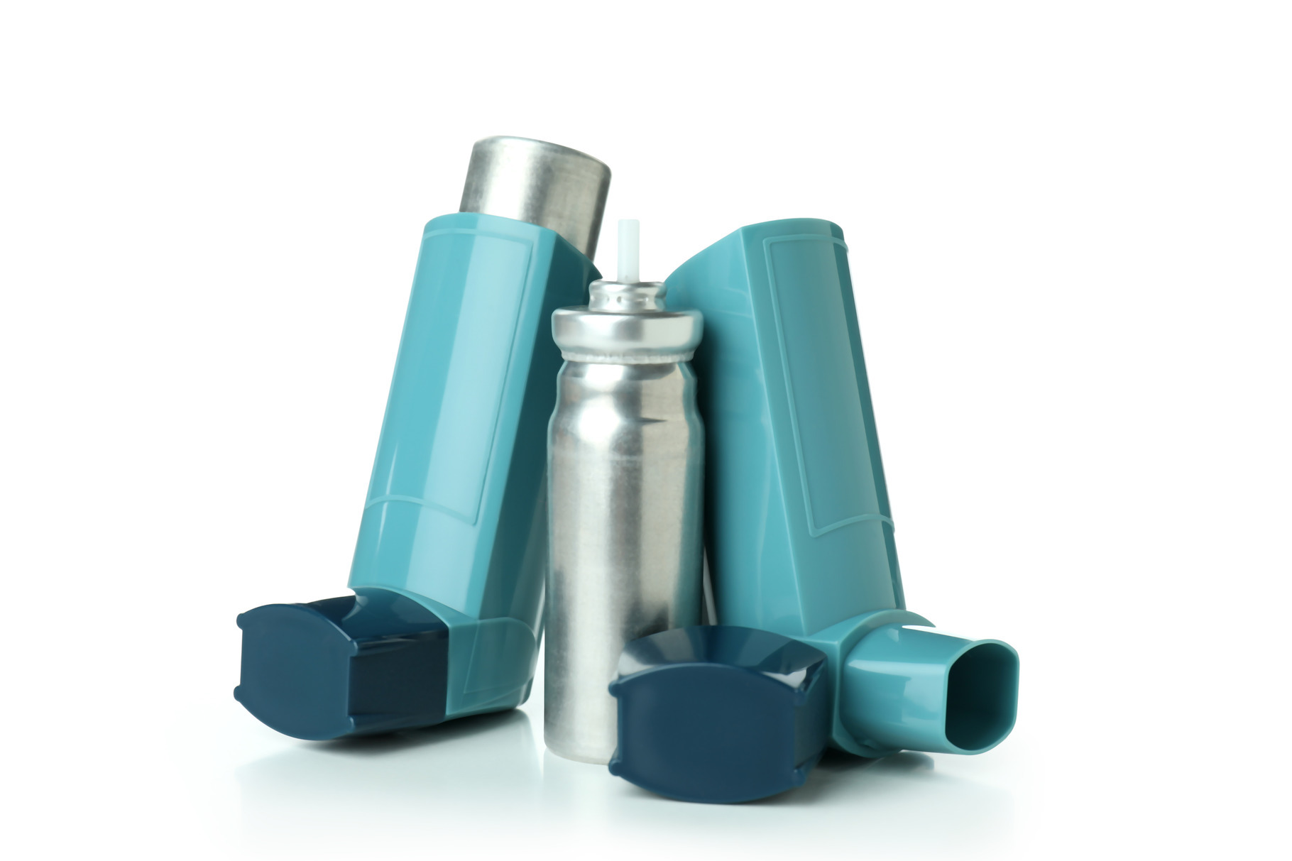 Blue asthma inhalers isolated on white background, a Health & Medical ...