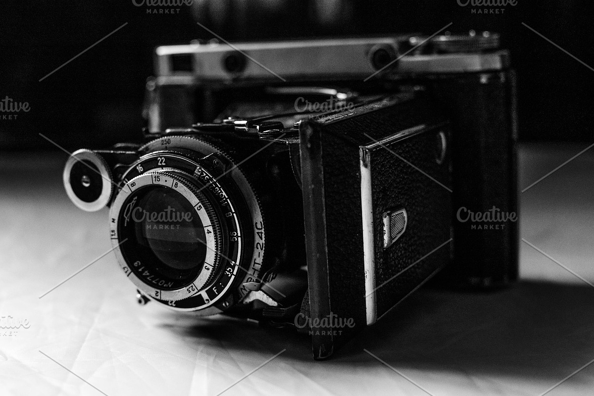 Vintage camera package, a Technology Photo by maxsokal | Creative Market