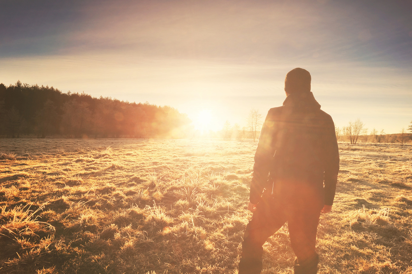 One man on rising sun background, a Person Photo by PixieMe