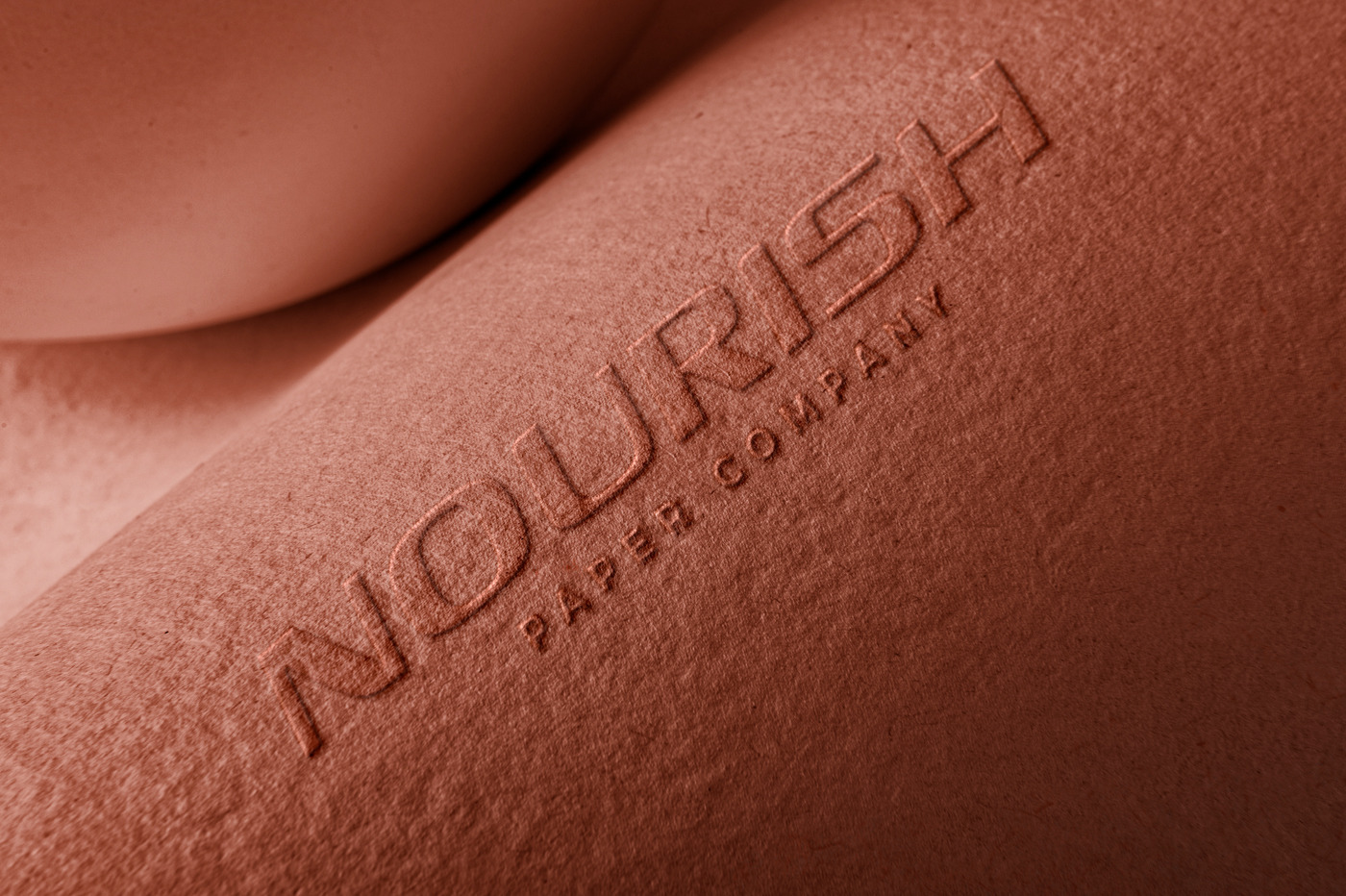 Embossed Effect Paper Logo Mockup, a Product Mockup by DesignNeutrons