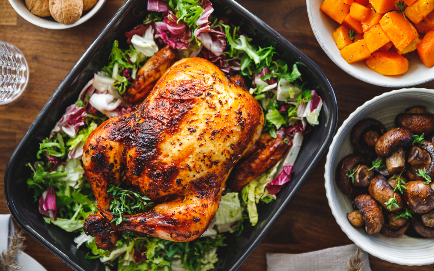 Top view of a whole roasted chicken, a Food & Drink Photo by Edalin's Store