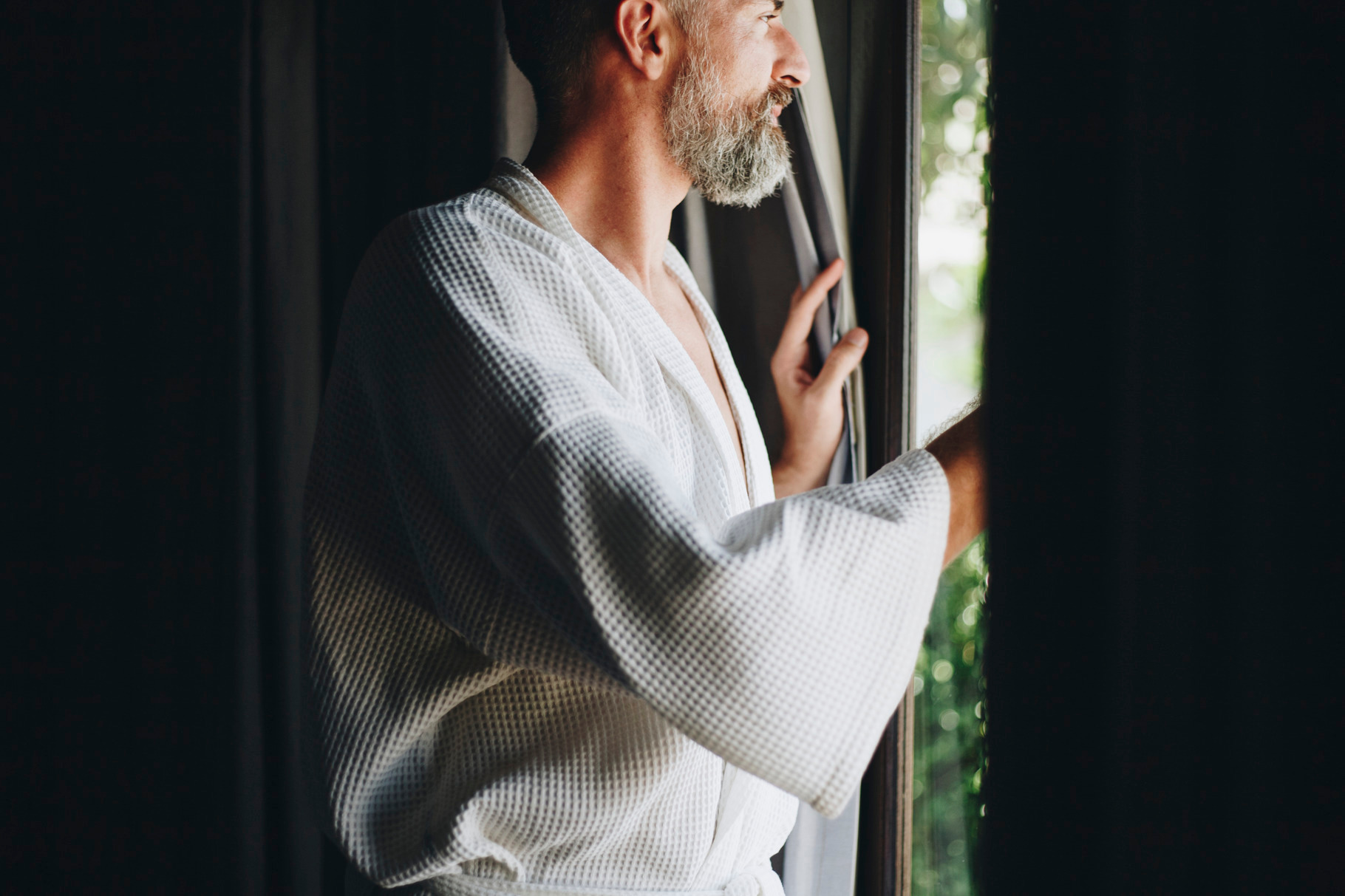 Cheerful man in a bathrobe, a Person Photo by rawpixel