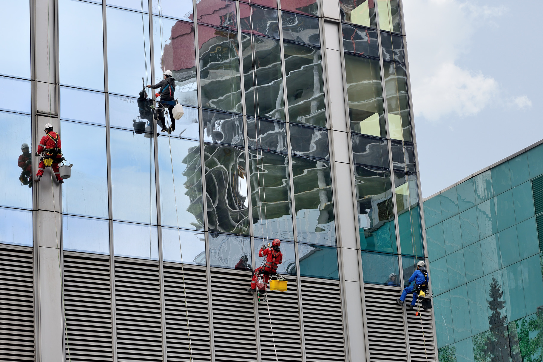 High-rise facade cleaning services, an Industrial Photo by FedotovAnatoly