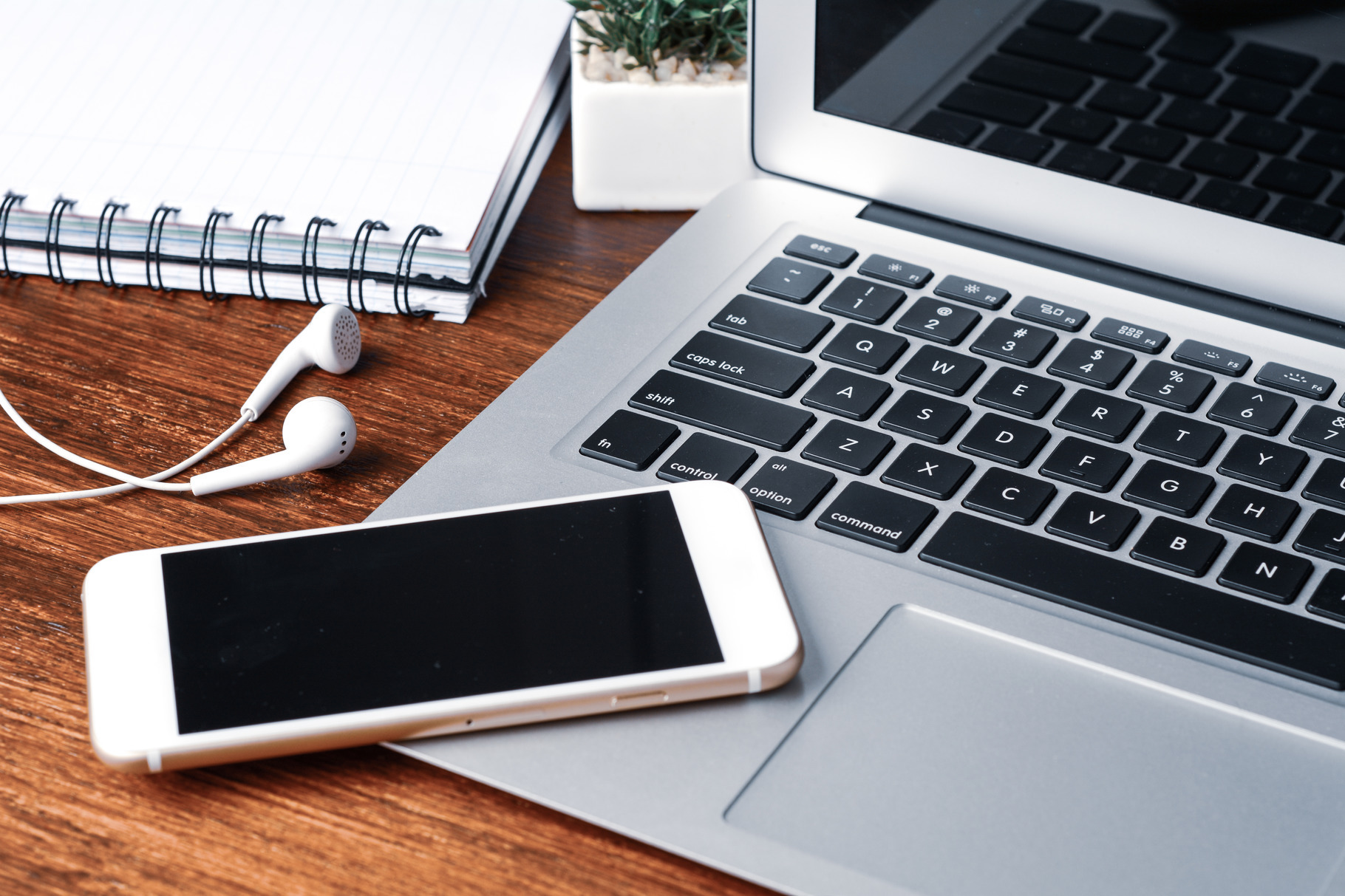 keyboard and phone with black screen, a Background Photo by Mego-studio