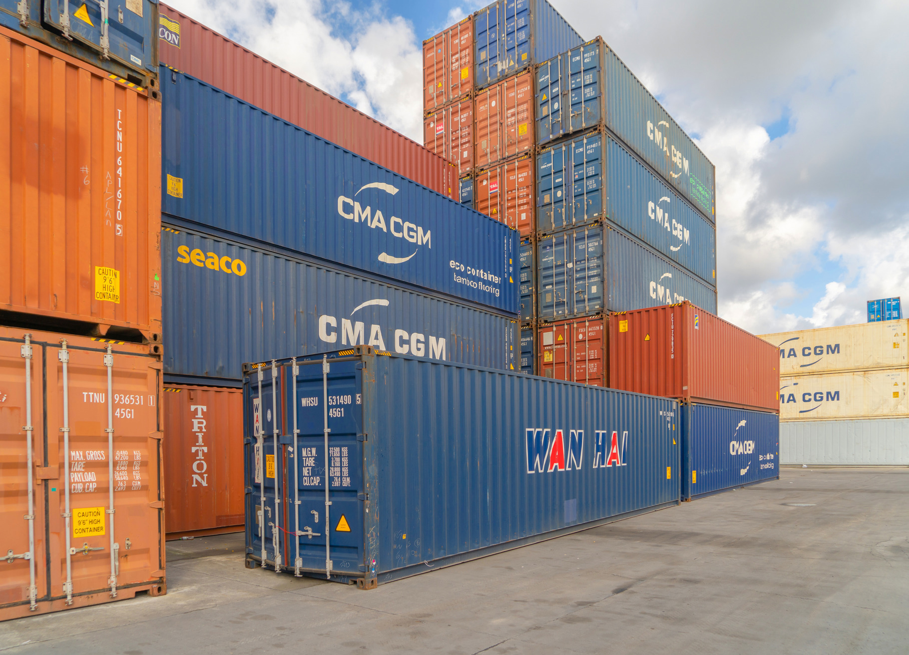 Shipping container site loading by crane in logistic port wareho, a ...