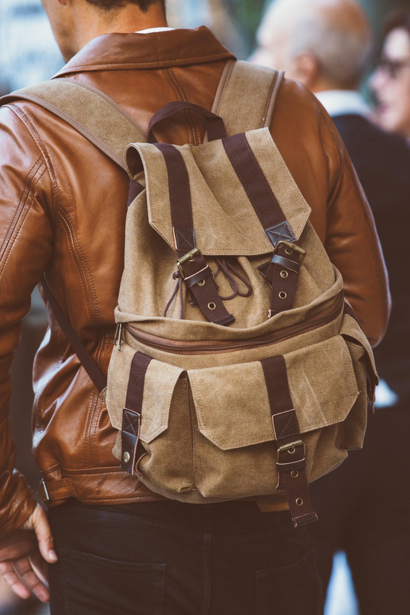 Man with stylish backpack, a Transportation Photo by Click and Photo